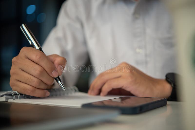 Businessperson Reading and Writing on Book.education Studying Knowledge ...