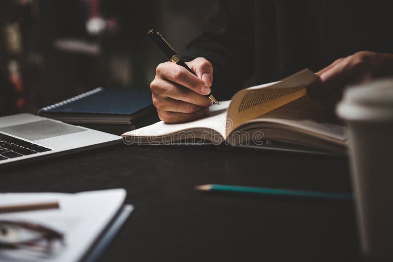 Businessperson Reading and Writing on Book.education Studying Knowledge ...