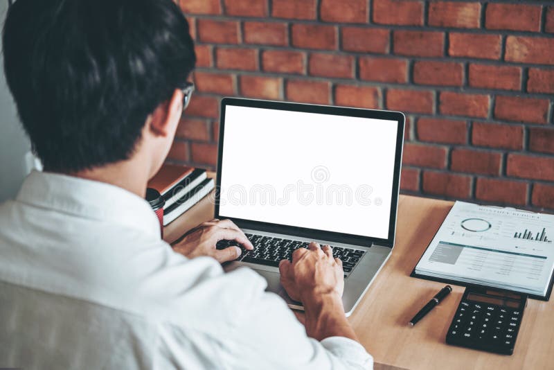 Businesss Man Using Laptop with Blank Screen in the Office Stock Photo ...