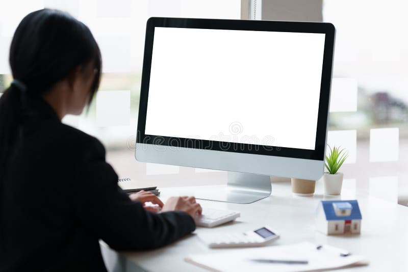 Businesswoman or Accountant Working on Desktop Computer at Office ...