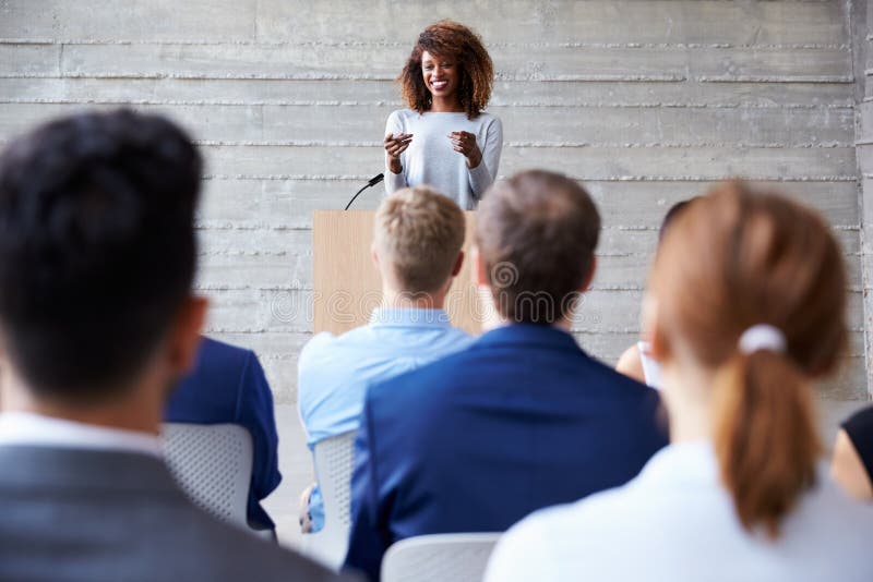 Businesswoman Addressing Multi-Cultural Office Staff Meeting Stock ...