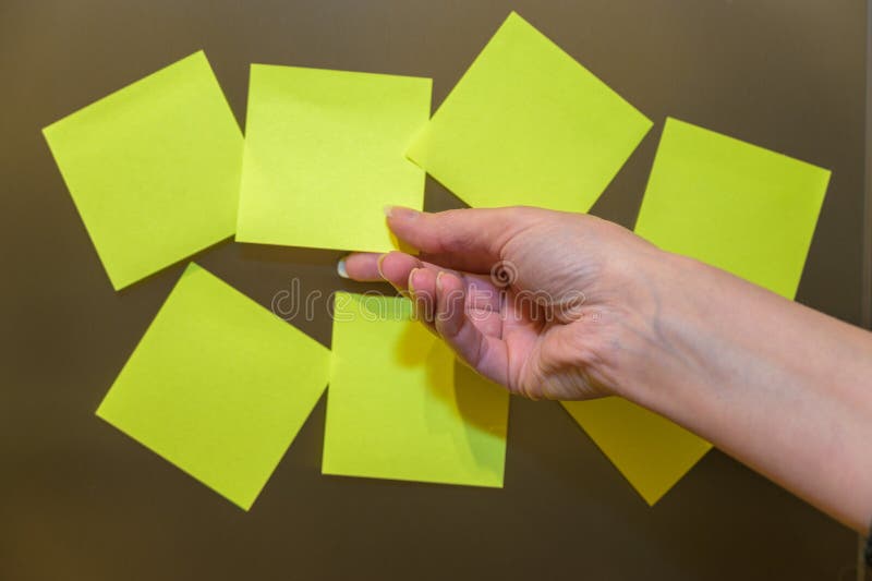 Businesswoman Attaching Yellow Sticky Notes on Flip Chart. Mockup with ...