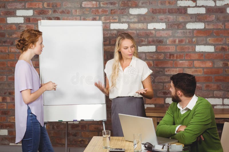 Businesswoman Briefing Colleagues in Office Stock Image - Image of ...