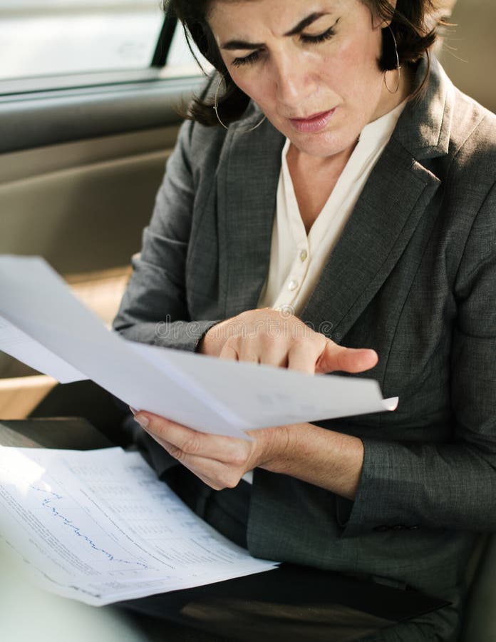 Businesswoman Busy Working Car Inside Stock Image - Image of indoors ...