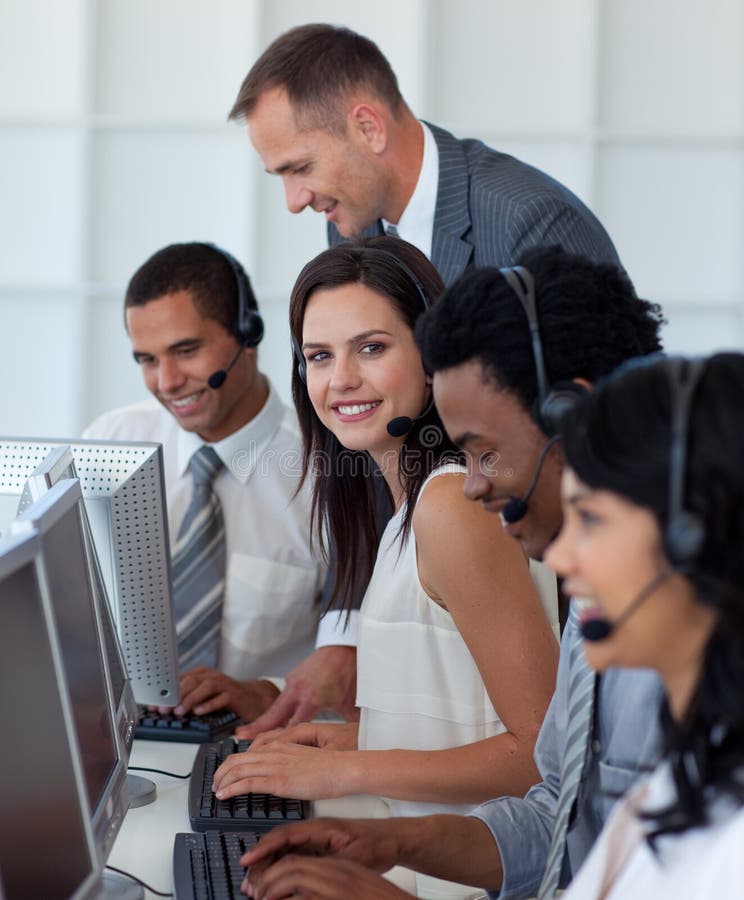 Businesswoman in a Call Center with Her Team Stock Image - Image of ...