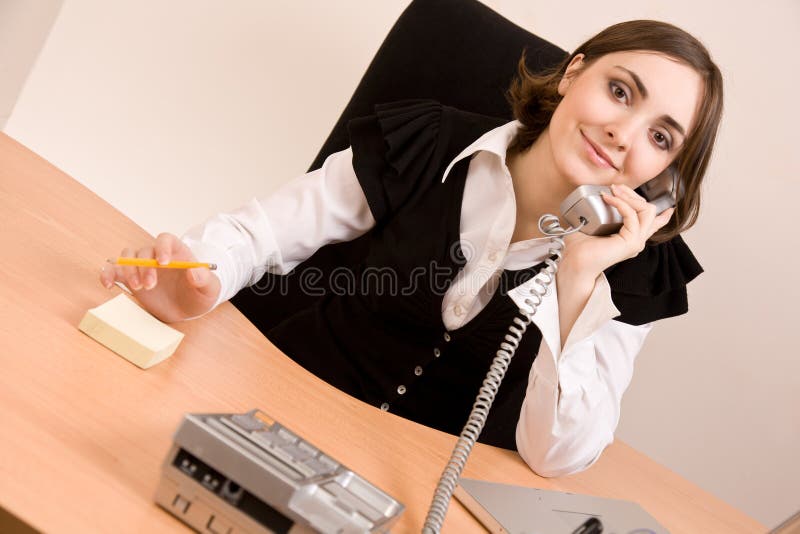 Businesswoman Calling by Phone at Office Stock Image - Image of jumper ...