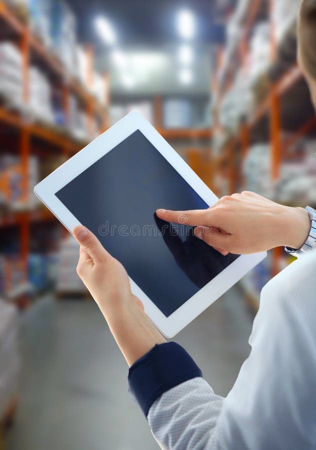 Checking Inventory in Minimart on Touchscreen Tablet Stock Photo ...