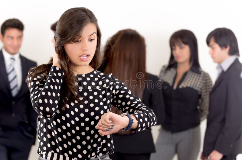 Businesswoman Checking the Time, Group Shot Stock Image - Image of ...