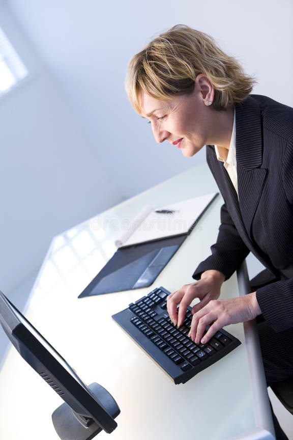 Businesswoman on Computer stock image. Image of businesswoman - 5620757