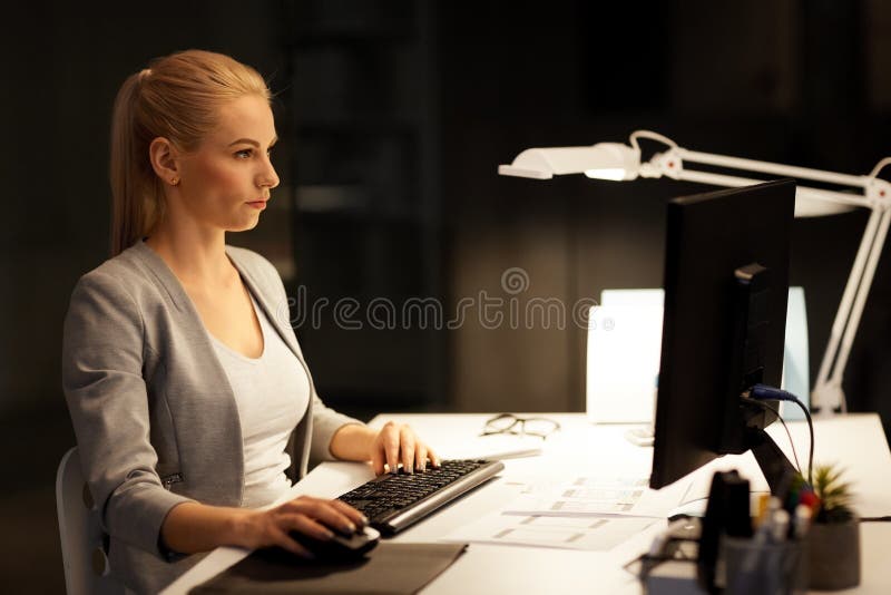 Businesswoman at Computer Working at Night Office Stock Photo - Image ...