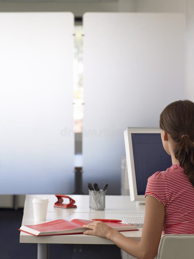 Businesswoman at Desk Back View Stock Image - Image of hand ...