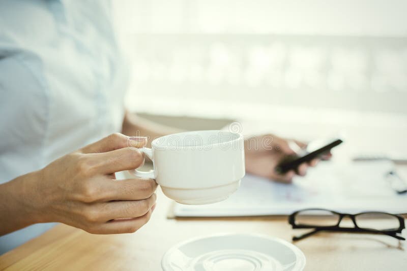 Businesswoman Drinking Coffee Stock Image - Image of call, paper: 80310433