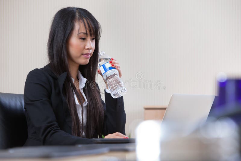 Businesswoman Drinking Water at Work Stock Image - Image of lifestyle ...