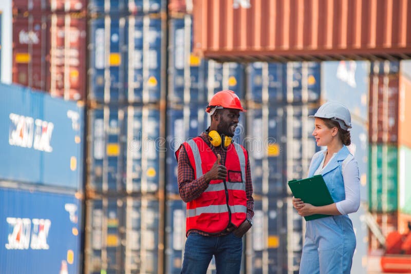 Businesswoman and Engineer Talking and Checking Loading Containers Box ...