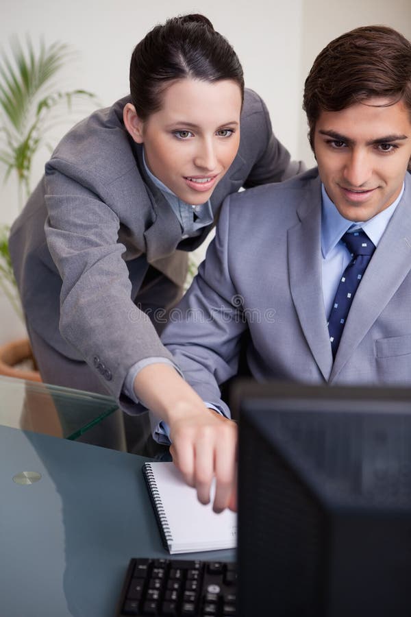 Businesswoman Explaining Her Colleague What His Task is Stock Photo ...