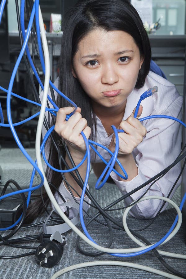 Businesswoman with Computer Cords. Stock Image - Image of electronics ...