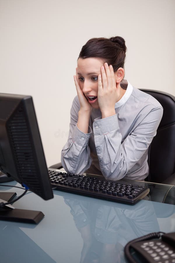 Businesswoman Getting Surprised by Computer Stock Photo - Image of ...