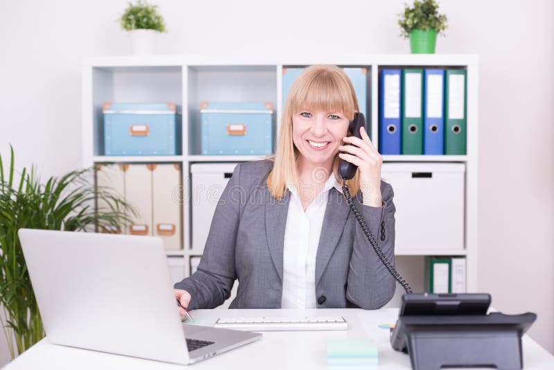 Businesswoman with Happy Emotions at Work at the Office Stock Photo ...