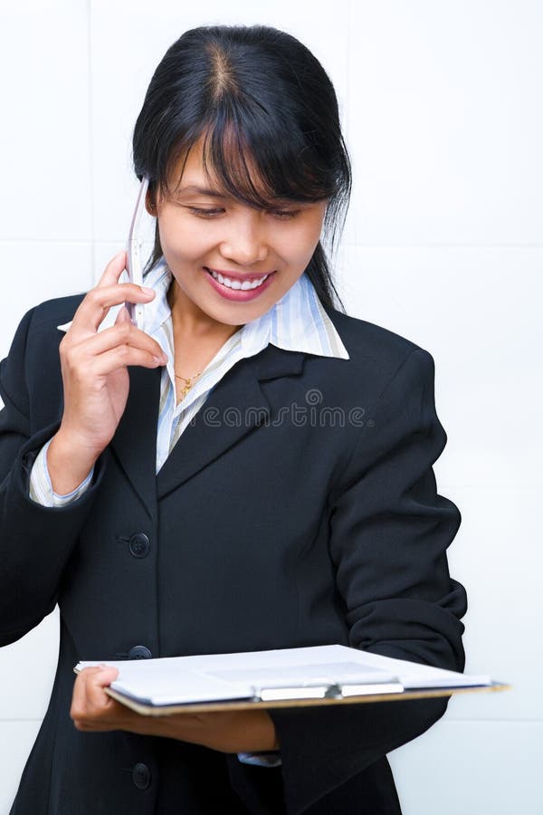 Businesswoman Having Discussion Over the Phone Stock Photo - Image of ...