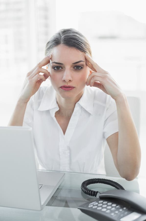 Businesswoman Having a Headache at Work Stock Photo - Image of pretty ...