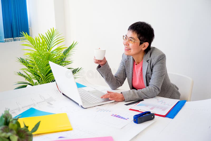 Businesswoman having tea stock photo. Image of businesswoman - 97497334