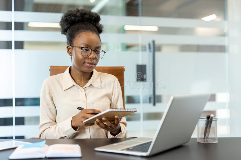 Businesswoman Having a Video Call in Modern Office Setting, Taking ...