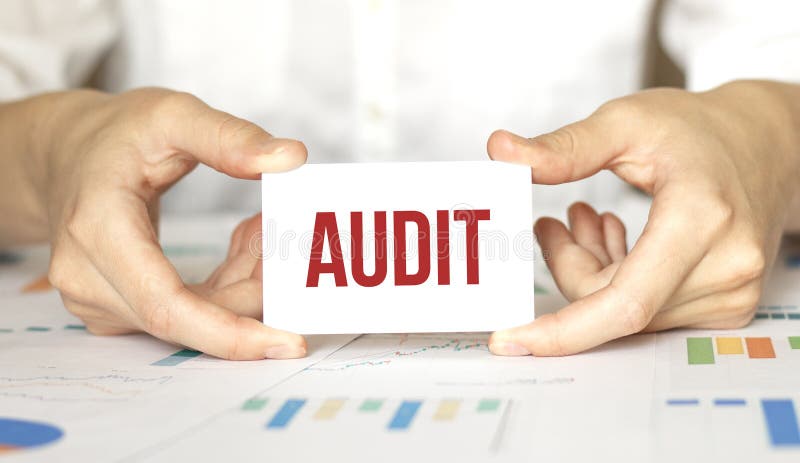 Businesswoman Holding a Card with Text AUDIT Stock Image - Image of ...