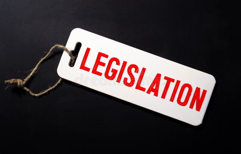 Businesswoman Holding a Card with Text LEGISLATION Stock Photo - Image ...