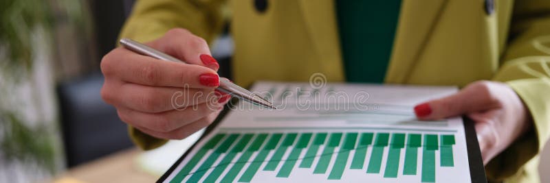 Businesswoman Holds Financial Report and Analytics in Charts Stock ...