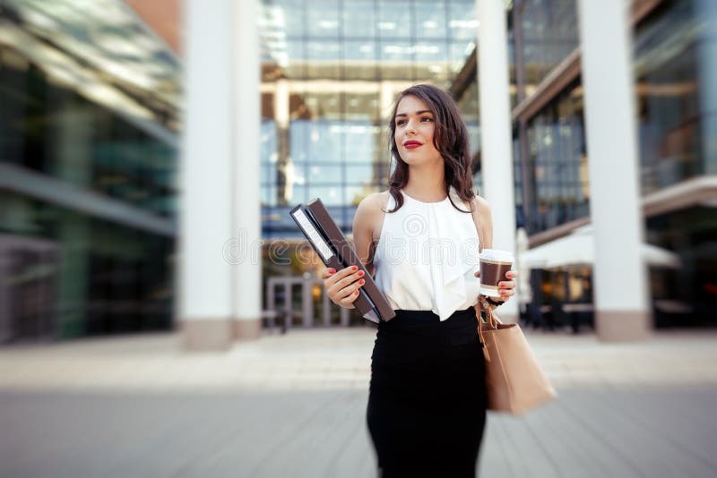Businesswoman in a hurry stock image. Image of modern - 76896345