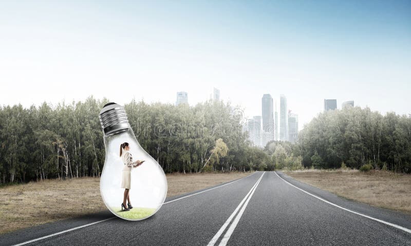 Businesswoman Inside Light Bulb Stock Image - Image of lightbulb ...