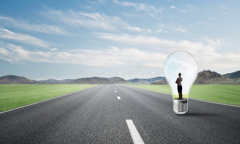 Businesswoman Inside Light Bulb Stock Photo - Image of technology, suit ...