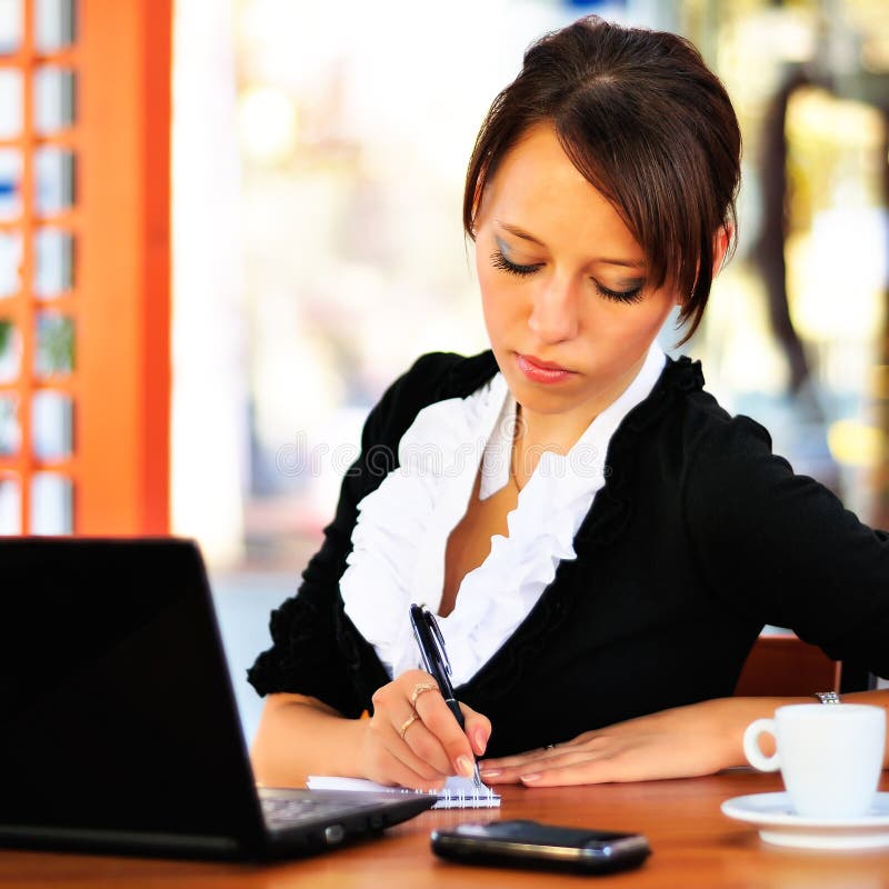 Businesswoman with Laptop Making Some Notes Stock Image - Image of ...