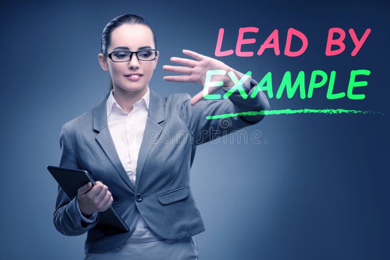 Businesswoman in Lead by Example Concept Stock Photo - Image of paper ...