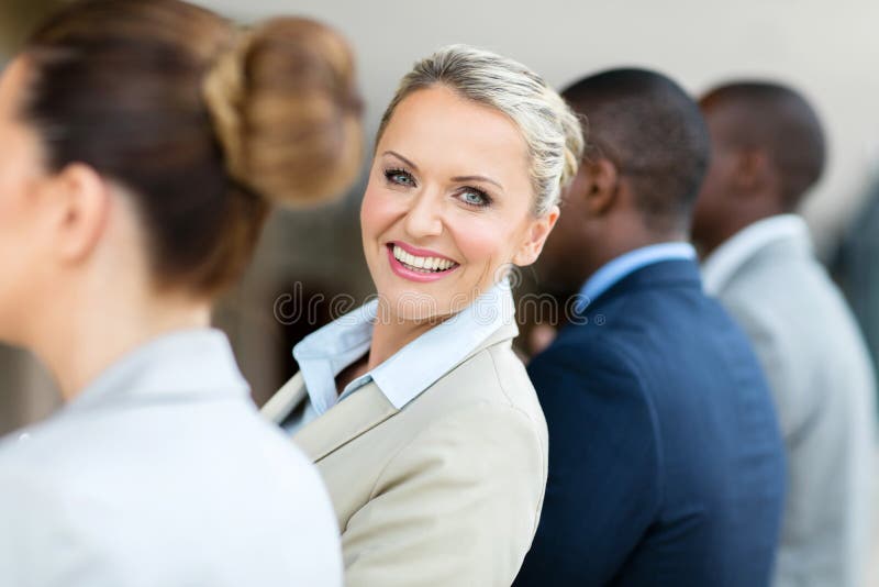 Businesswoman looking back stock photo. Image of diversity - 67651774
