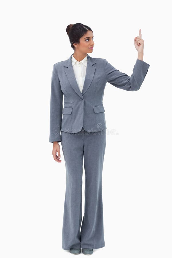 Businesswoman Looking at Hand while Pointing Up Stock Image - Image of ...