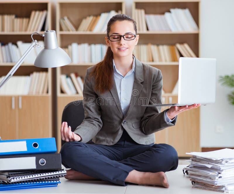 Businesswoman Meditating in the Office Stock Photo - Image of healthy ...