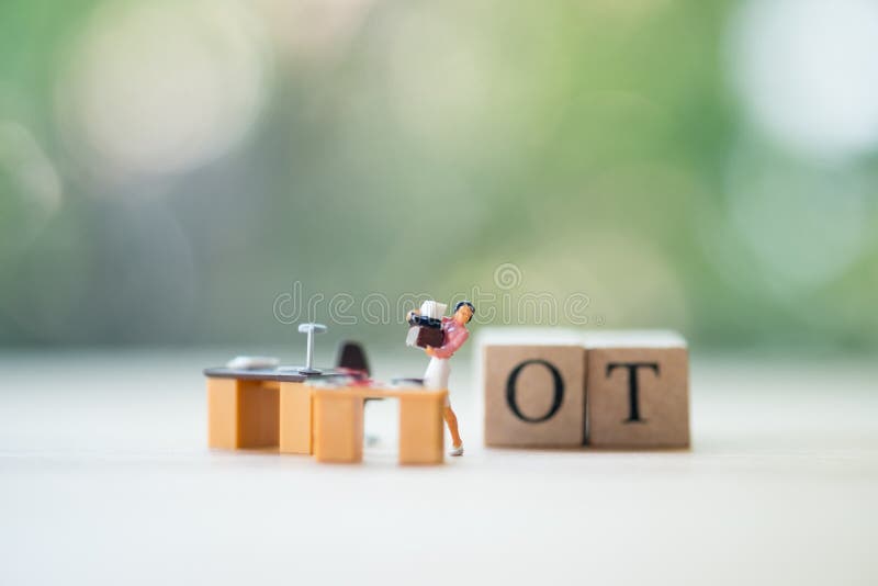 Businesswoman Miniature Working Hard in Overtime at Work Stock Photo ...