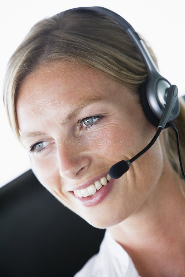 Businesswoman in Office Wearing Headset Stock Image - Image of ...