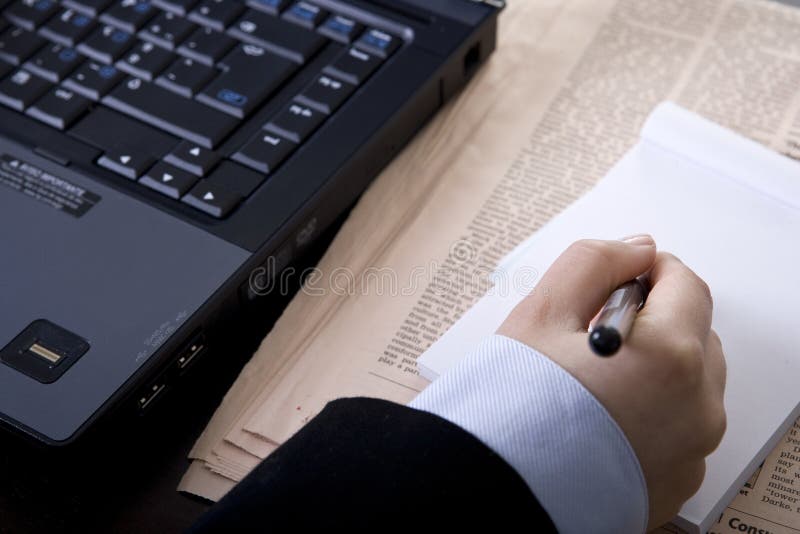 Businesswoman in Office Writing in Notebook Stock Photo - Image of ...