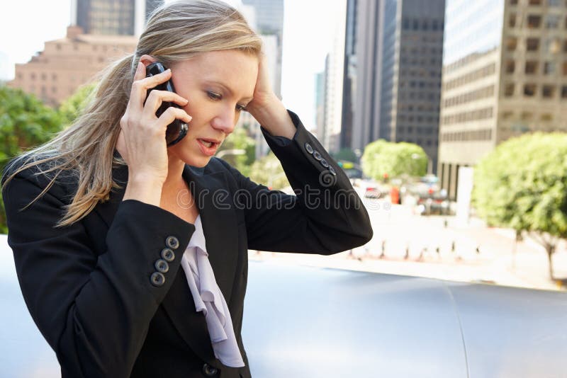 Businesswoman Outside Office on Mobile Phone Stock Image - Image of ...