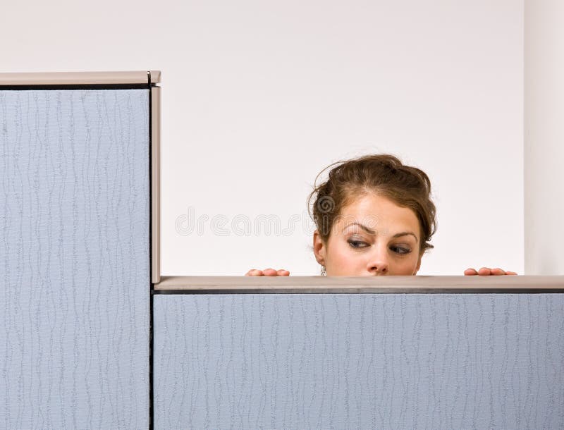 Businesswoman Peering Over Cubicle Wall Stock Image - Image of wall ...