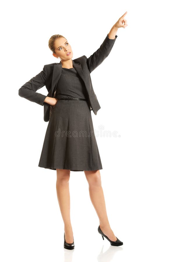 Businesswoman Pointing High Stock Image - Image of back, black: 49115203