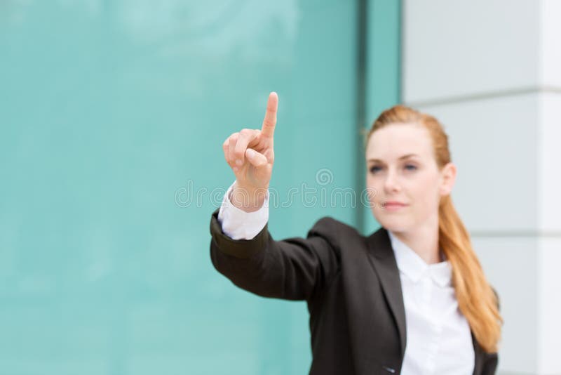 Businesswoman Pointing at Something Stock Image - Image of business ...