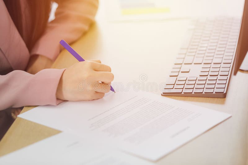 Businesswoman Reading and Checking Document Stock Image - Image of ...
