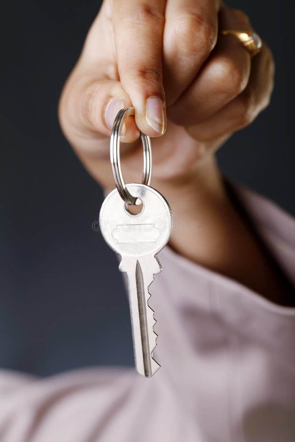 Businesswoman S Hand Holding Key Stock Photo - Image of business ...