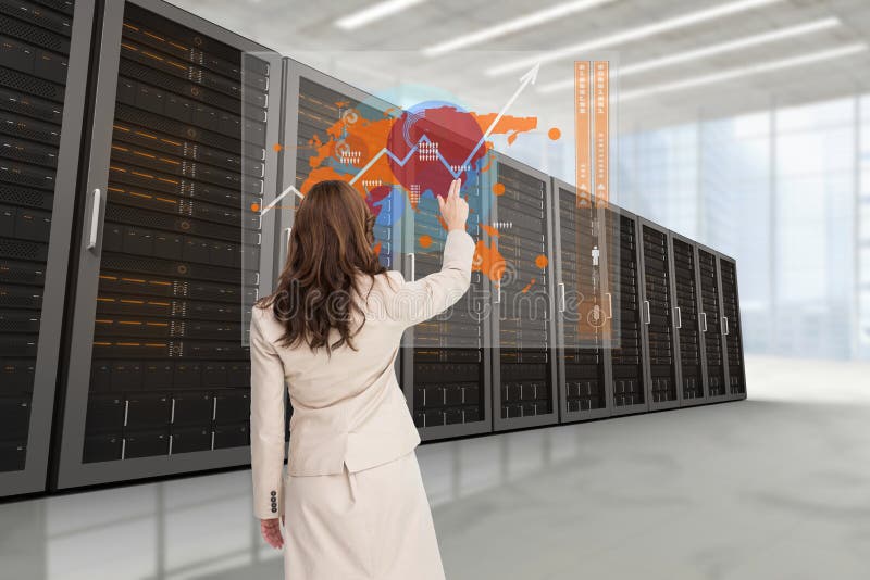 Businesswoman Showing the Graphics from the Back Against Data Center ...