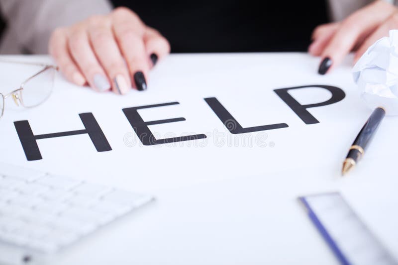 A Businesswoman Showing Help Flag at Workplace in Office Stock Photo ...