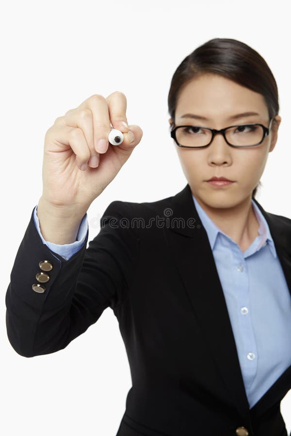 Businesswoman Showing Writing Gesture Stock Photo - Image of ...