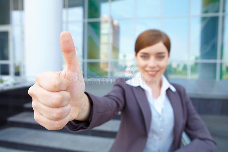 Businesswoman shows thumb. stock photo. Image of closeup - 39130906
